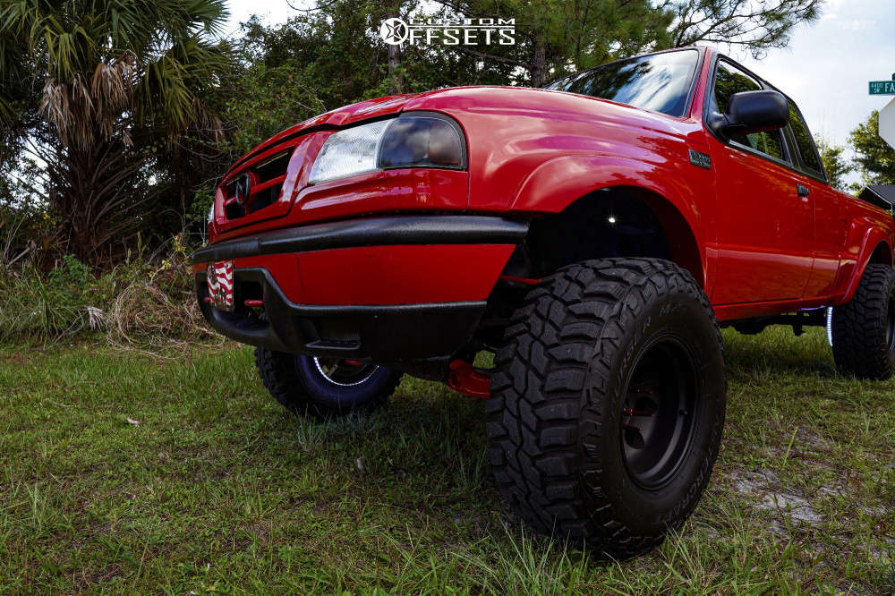 2001 Mazda B3000 with 15x10 -47 Pro Comp 69 and 33/12.5R15 Mastercraft ...