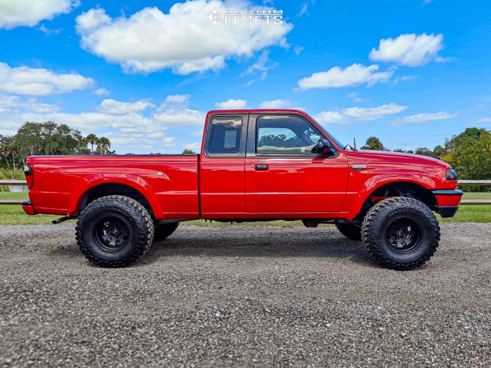 2001 Mazda B3000 with 15x10 -47 Pro Comp 69 and 33/12.5R15 Mastercraft ...