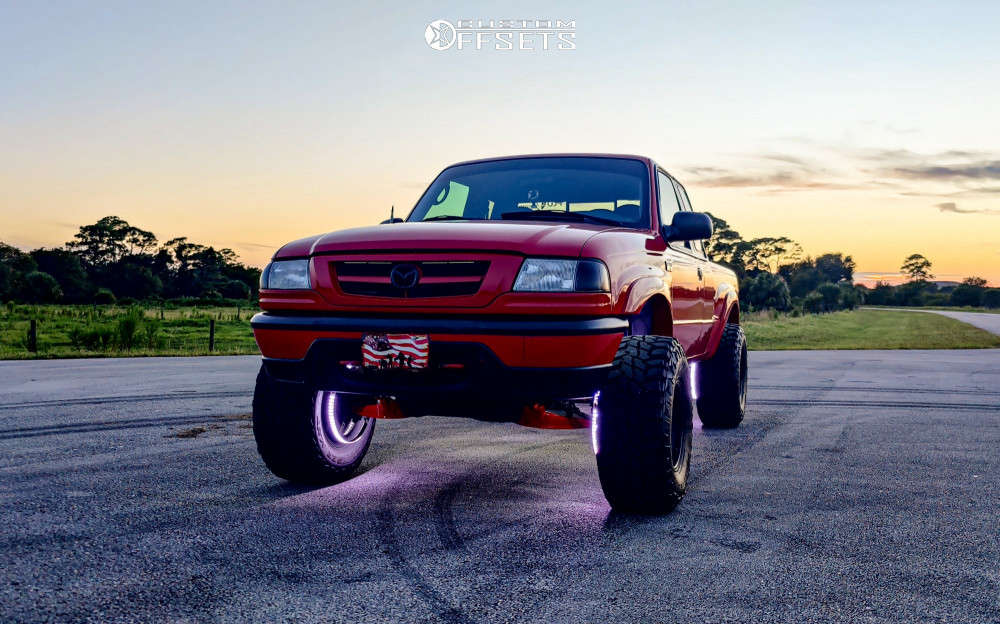 2001 Mazda B3000 with 15x10 -47 Pro Comp 69 and 33/12.5R15 Mastercraft ...