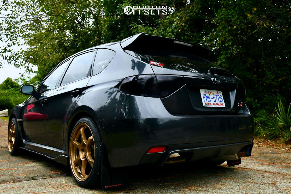 2009 Subaru Impreza with 18x9.5 44 Motegi Mr145 and 245/35R18 Toyo ...