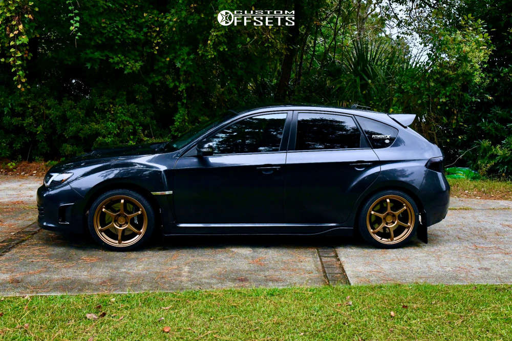 2009 Subaru Impreza with 18x9.5 44 Motegi Mr145 and 245/35R18 Toyo ...