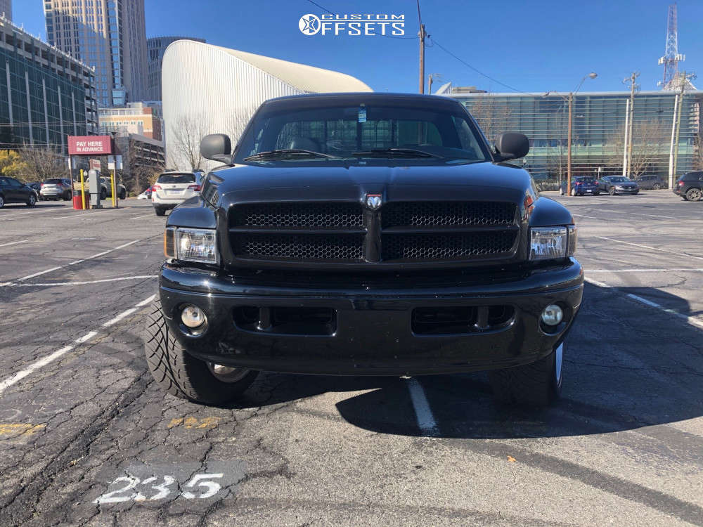 2001 Dodge Ram 1500 with 20x12 -44 V-Rock Anvil and 305/50R20 Nitto ...