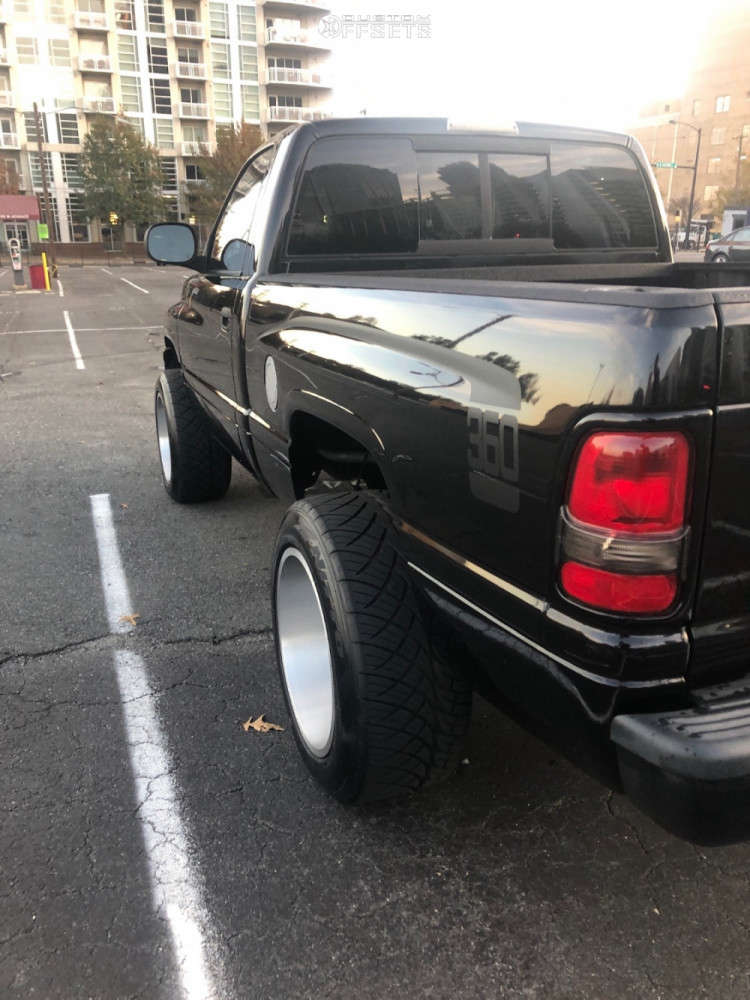 2001 Dodge Ram 1500 with 20x12 -44 V-Rock Anvil and 305/50R20 Nitto ...