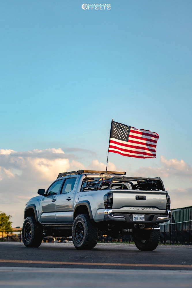 2017 Toyota Tacoma with 20x9 -24 Helo He900 and 35/12.5R20 Nitto Trail ...