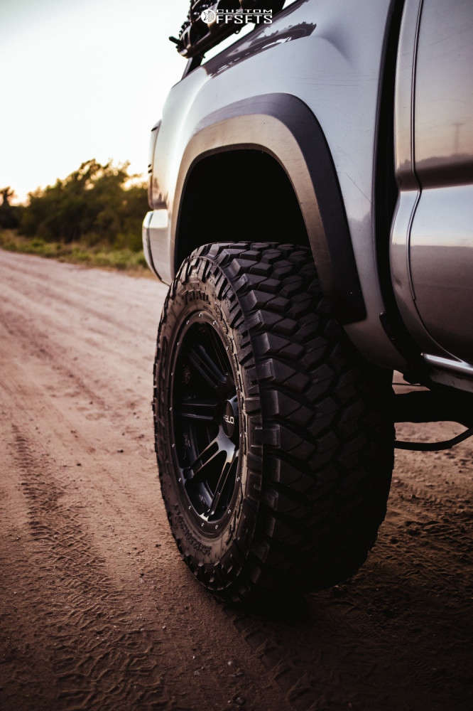2017 Toyota Tacoma with 20x9 -24 Helo He900 and 35/12.5R20 Nitto Trail ...