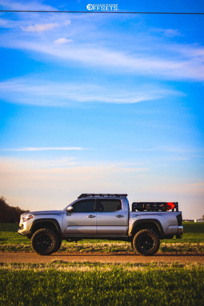 2017 Toyota Tacoma with 20x9 -24 Helo He900 and 35/12.5R20 Nitto Trail ...