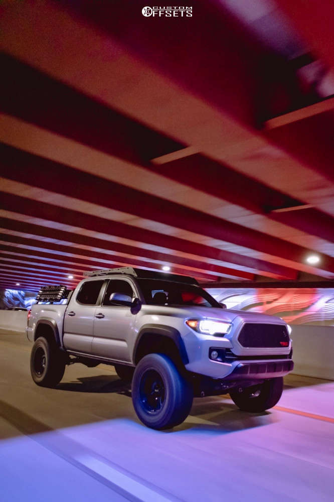 2017 Toyota Tacoma with 20x9 -24 Helo He900 and 35/12.5R20 Nitto Trail ...
