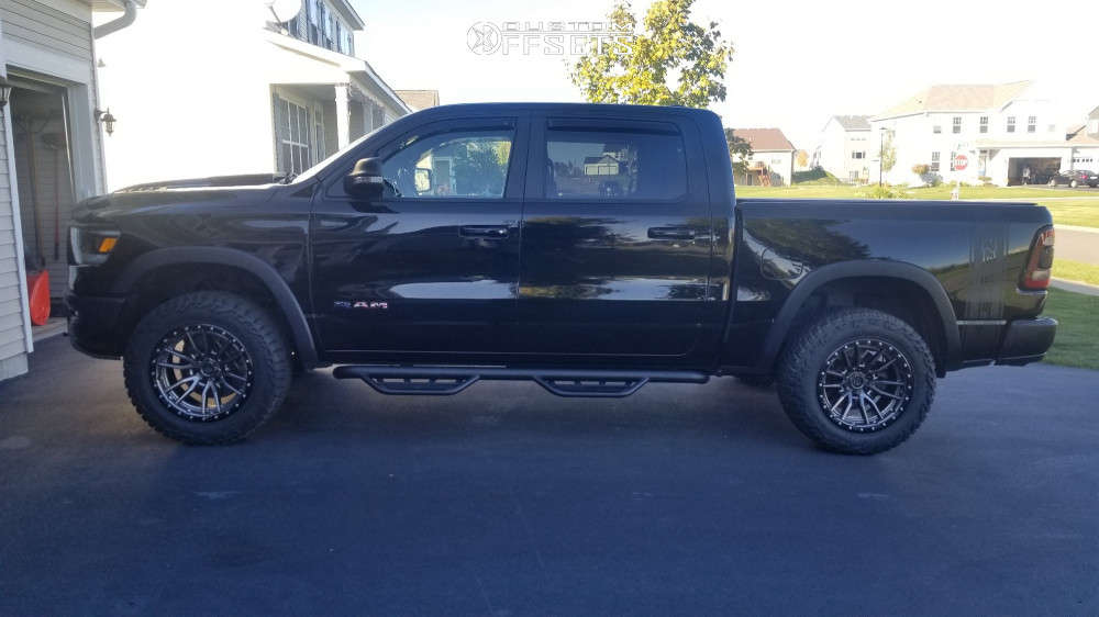 2019 Ram 1500 with 20x10 -18 Fuel Rebel and 33/12.5R20 Mickey Thompson ...