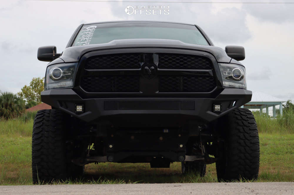 2014 Ram 1500 with 20x10 -24 Wicked Offroad W909 and 35/12.5R20 Radar ...