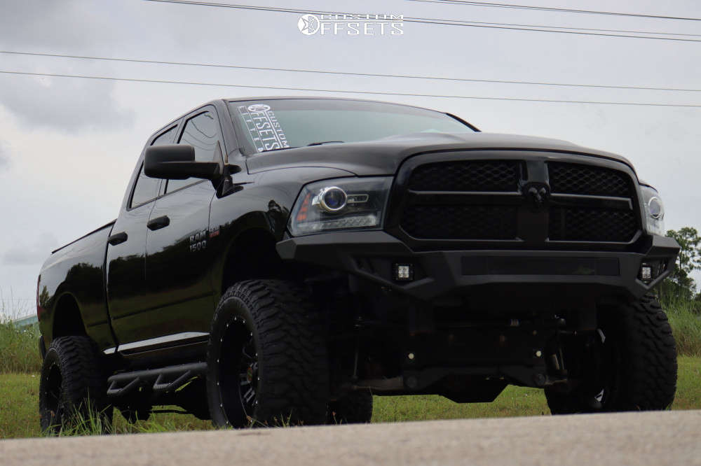 2014 Ram 1500 with 20x10 -24 Wicked Offroad W909 and 35/12.5R20 Radar ...