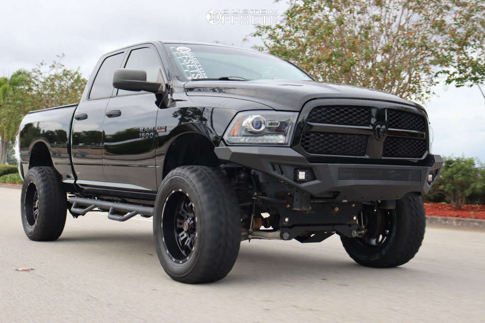 2014 Ram 1500 with 20x10 -24 Wicked Offroad W909 and 35/12.5R20 Radar ...