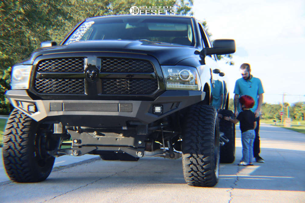 2014 Ram 1500 with 20x10 -24 Wicked Offroad W909 and 35/12.5R20 Radar ...