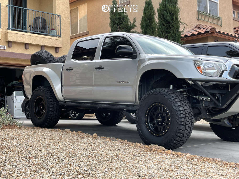 2012 Toyota Tacoma with 17x8.5 0 Vision Manx and 315/11.5R17 Mickey ...