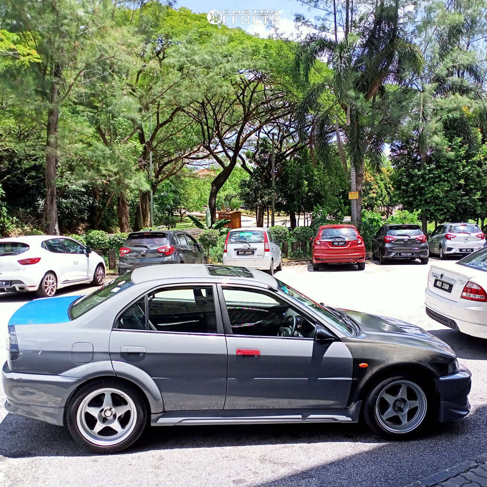 1998 Mitsubishi Mirage with 17x9.5 15 Desmond Regamaster and 245/45R17 ...