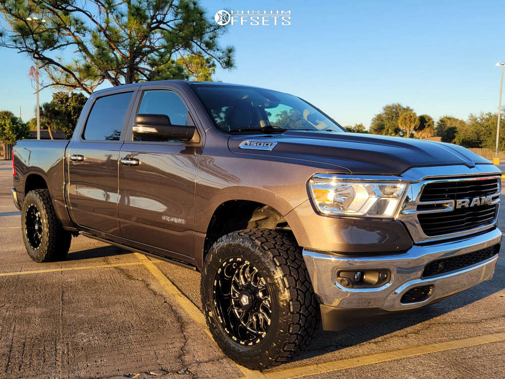2019 Ram 1500 with 20x10 -25 TIS 544BM and 35/12.5R20 Toyo Tires Open ...