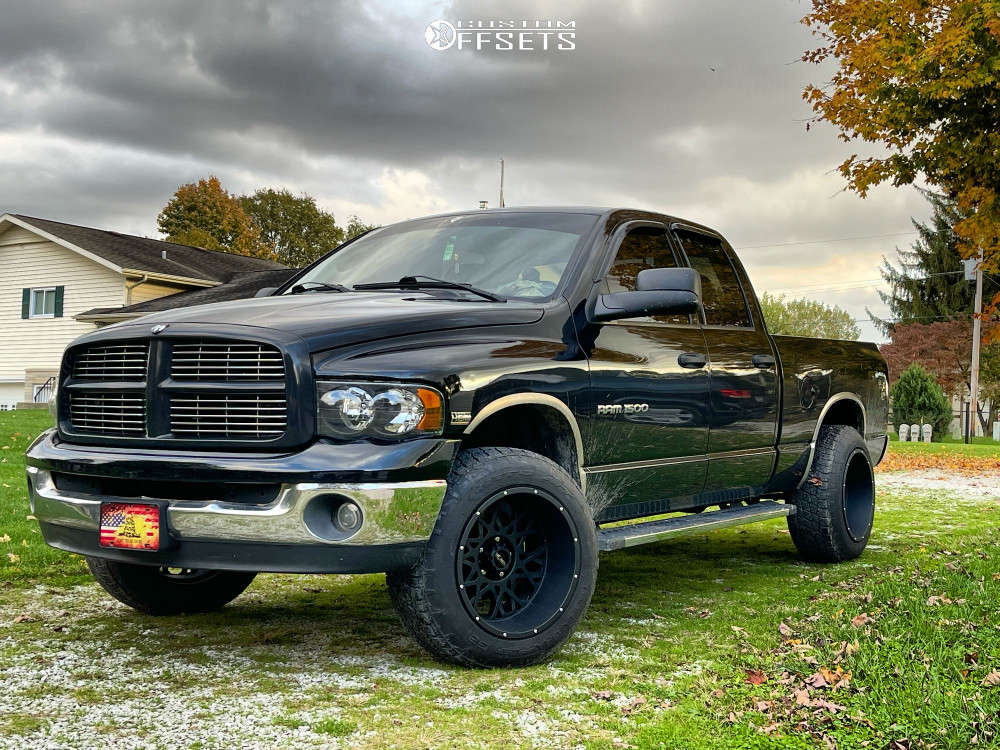 2005 Dodge Ram 1500 with 20x12 -51 Vision Rocker 412 and 275/60R20 ...