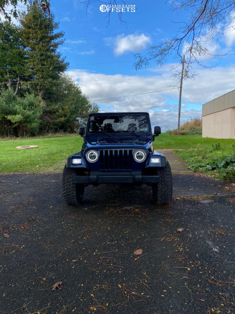 2005 Jeep Wrangler with 15x10 -44 Pro Comp Series 252 and 33/10.5R15 ...