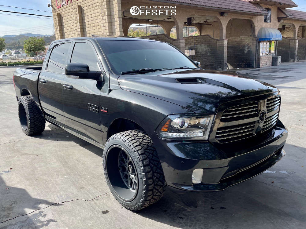 2017 Ram 1500 with 22x12 -51 Vision Rockers and 33/12.5R22 Nitto Ridge ...