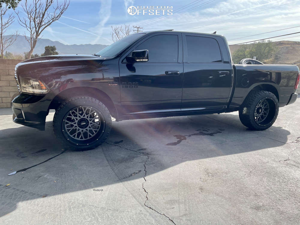 2017 Ram 1500 with 22x12 -51 Vision Rockers and 33/12.5R22 Nitto Ridge ...