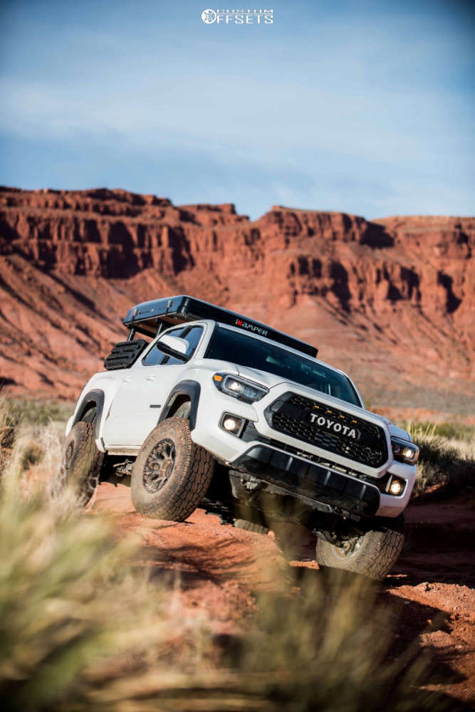 2019 Toyota Tacoma with 16x9 -12 Helo He835 and 285/11.5R16 Pro Comp A ...