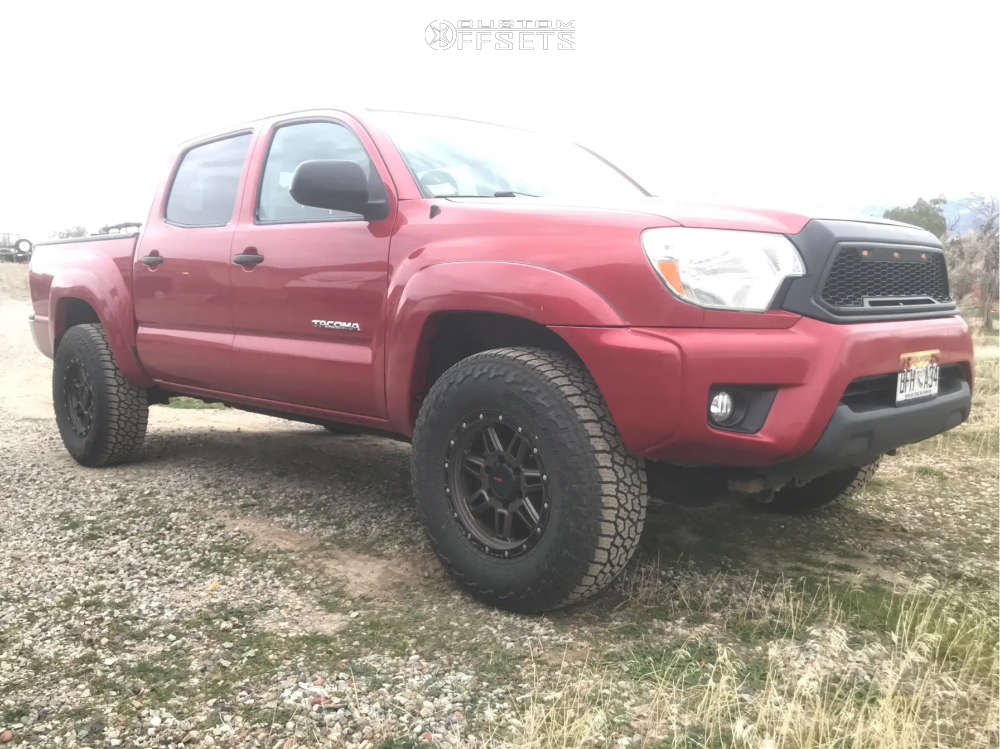 2015 Toyota Tacoma with 16x8 -6 DX4 Rebel and 265/75R16 Falken Wildpeak ...