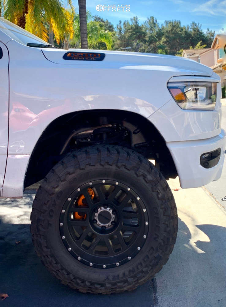 2019 Ram 1500 with 20x10 -24 Method Mr606 and 37/12.5R20 Toyo Tires ...