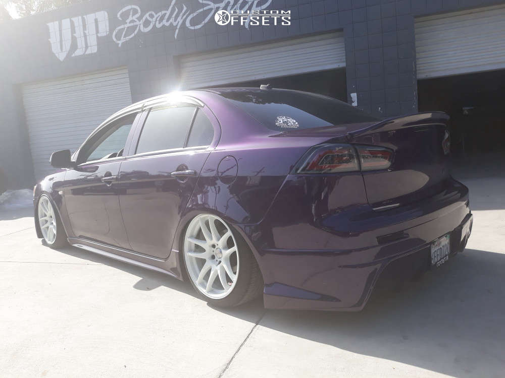 2009 Mitsubishi Lancer with 18x9.5 25 ESR Sr08 and 225/40R18 Toyo Tires ...