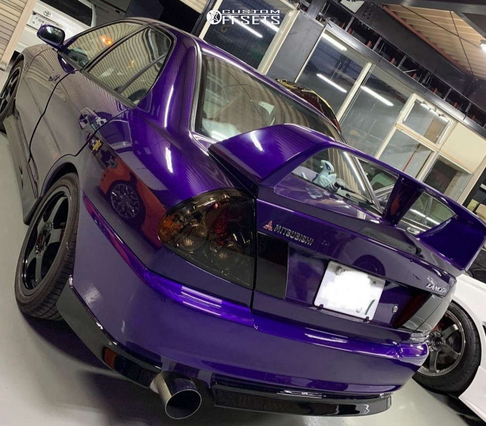 1997 Mitsubishi Lancer with 17x7.5 45 Enkei EVO IV and 215/45R17 Dunlop ...