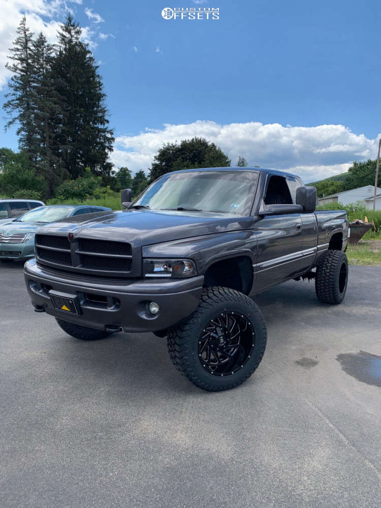 2002 Dodge Ram 2500 with 20x12 -44 Hardrock Crusher H704 and 35/12.5R20 ...