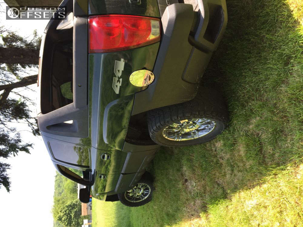 2002 Chevrolet Avalanche with 20x9 18 Helo HE835 and 33/13.5R20 Mickey ...