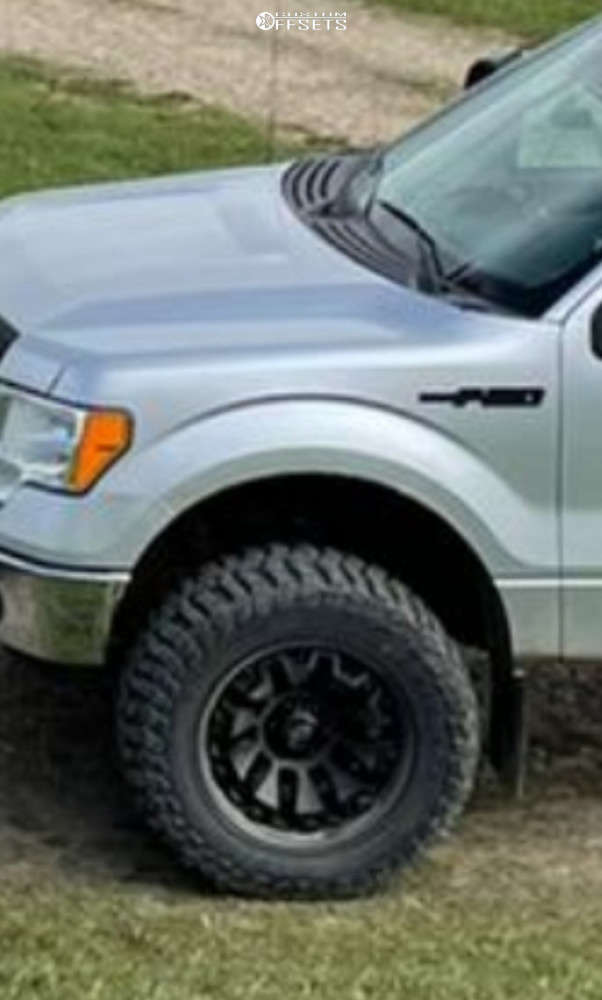 2011 Ford F-150 with 20x10 -24 Vision Armor and 35/12.5R20 Cooper ...