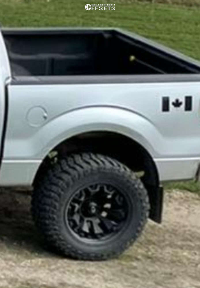 2011 Ford F-150 with 20x10 -24 Vision Armor and 35/12.5R20 Cooper ...