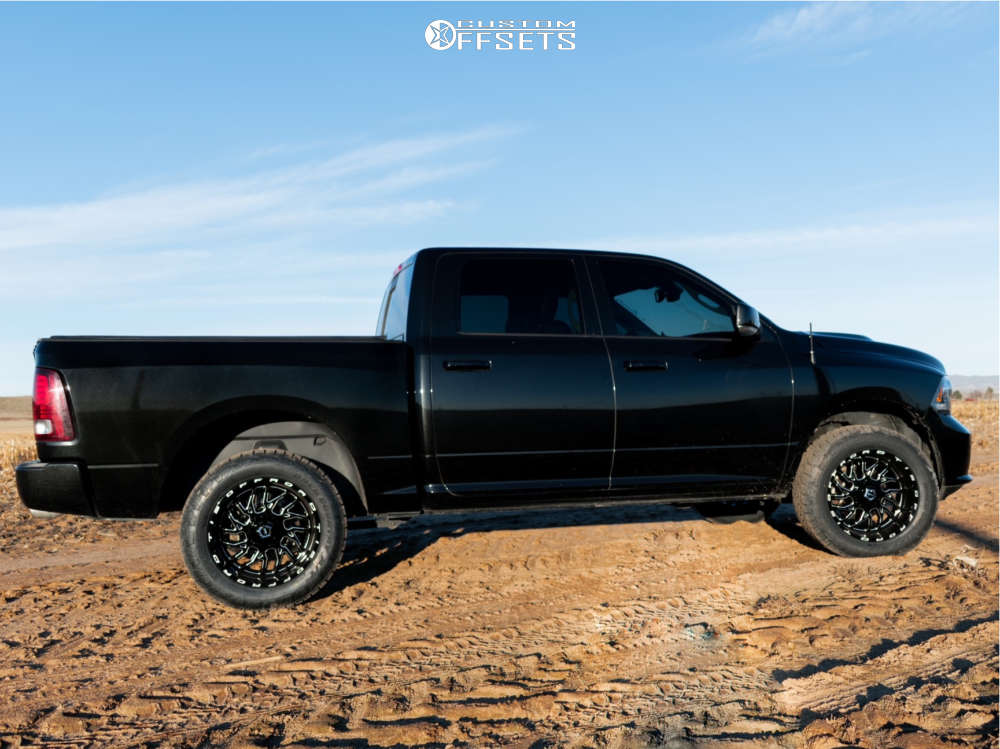 2017 Ram 1500 with 20x10 -25 TIS 544BM and 285/60R20 Toyo Tires Open ...