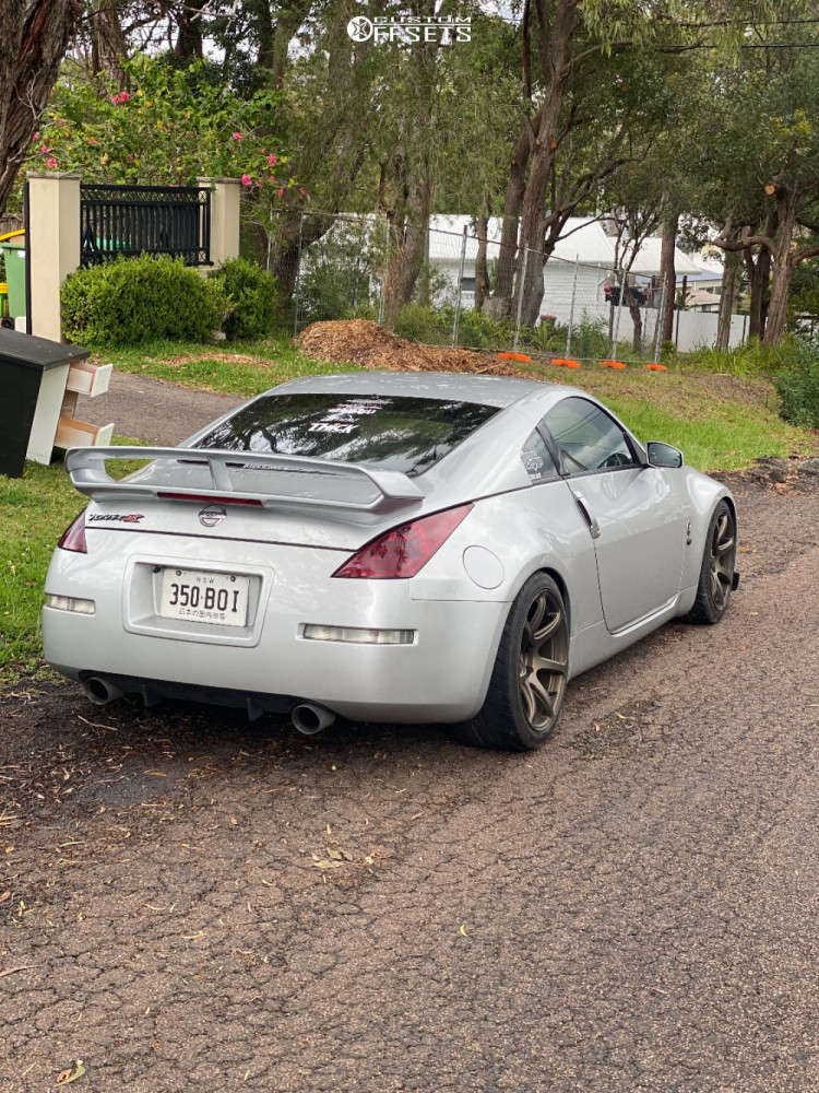 2008 Nissan 350Z with 18x9.5 22 Work Emotion T7r and 245/40R18 Hankook ...