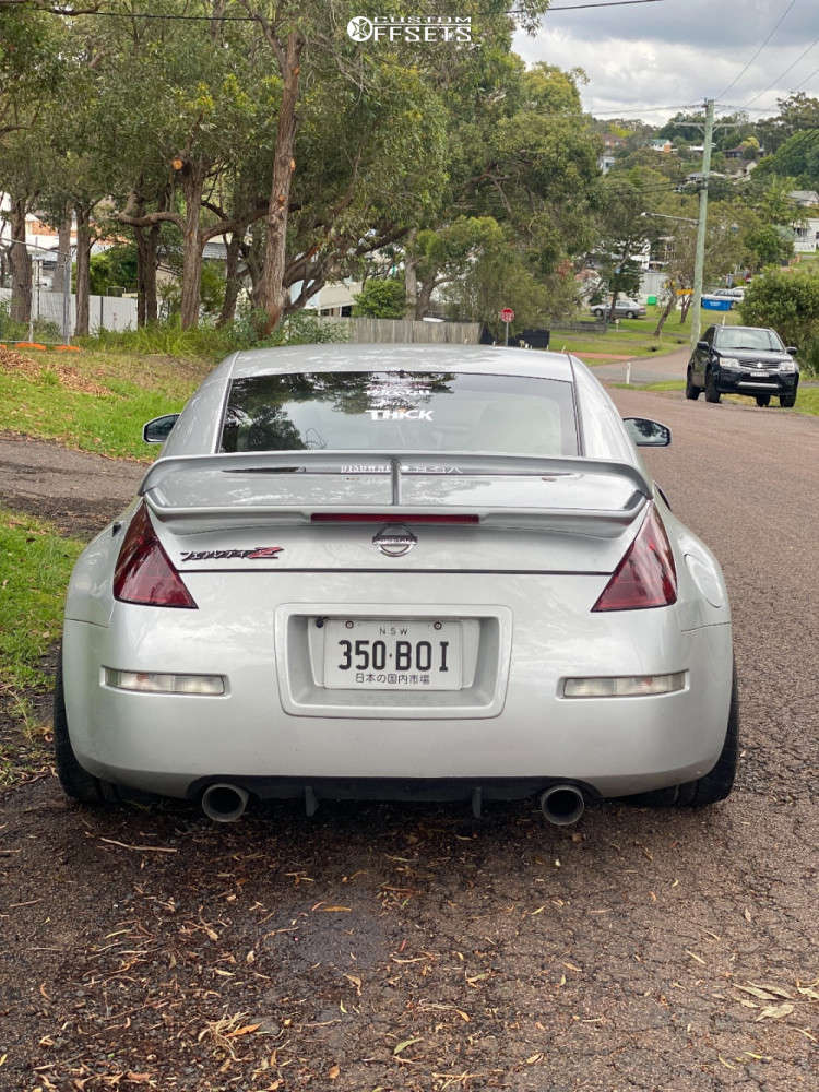 2008 Nissan 350Z with 18x9.5 22 Work Emotion T7r and 245/40R18 Hankook ...