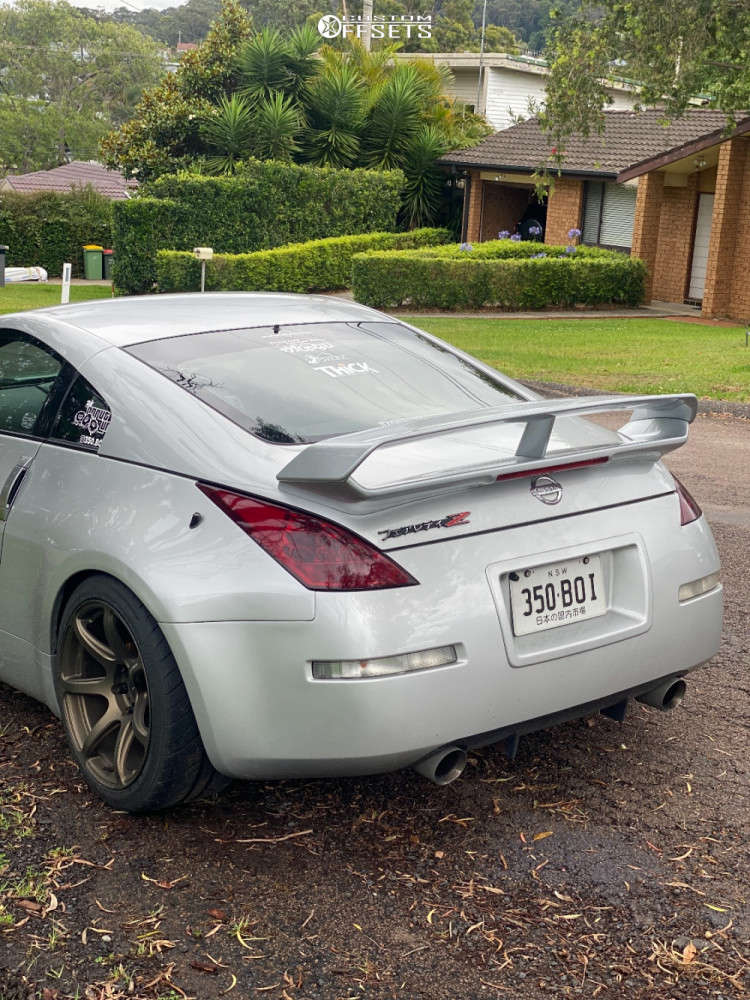 2008 Nissan 350Z with 18x9.5 22 Work Emotion T7r and 245/40R18 Hankook ...