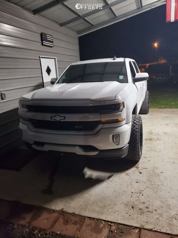 2018 Chevrolet Silverado 1500 with 24x12 -57 Vision Sliver and 33/12 ...
