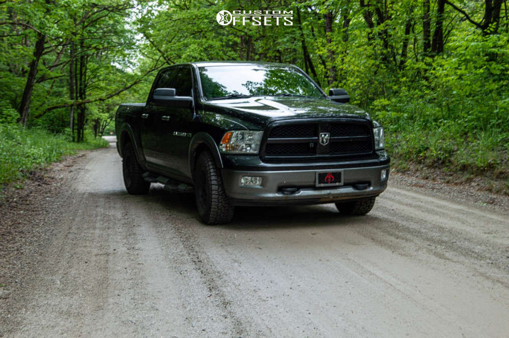 2011 Ram 1500 with 17x8 -20 Vision Raptor and 33/12.5R17 Falken ...