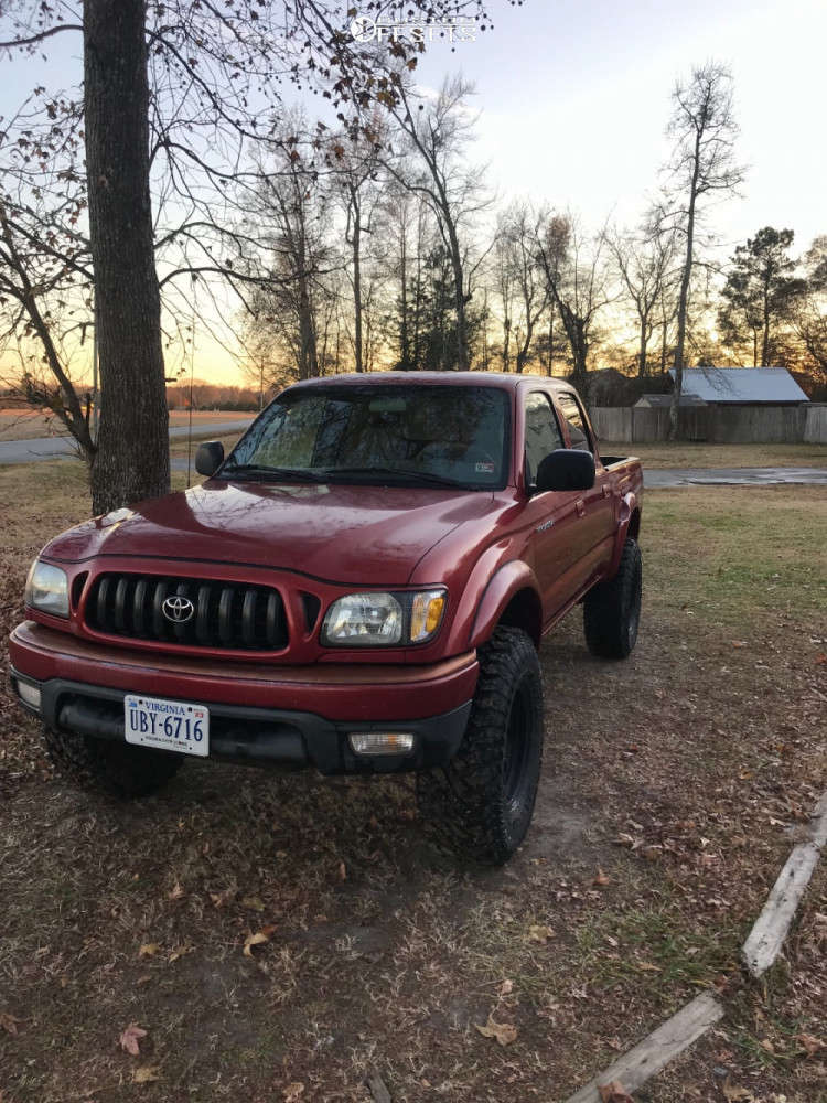 2002 Toyota Tacoma with 16x8 -12 Pro Comp 7069 and 33/11.5R16 Maxxis ...