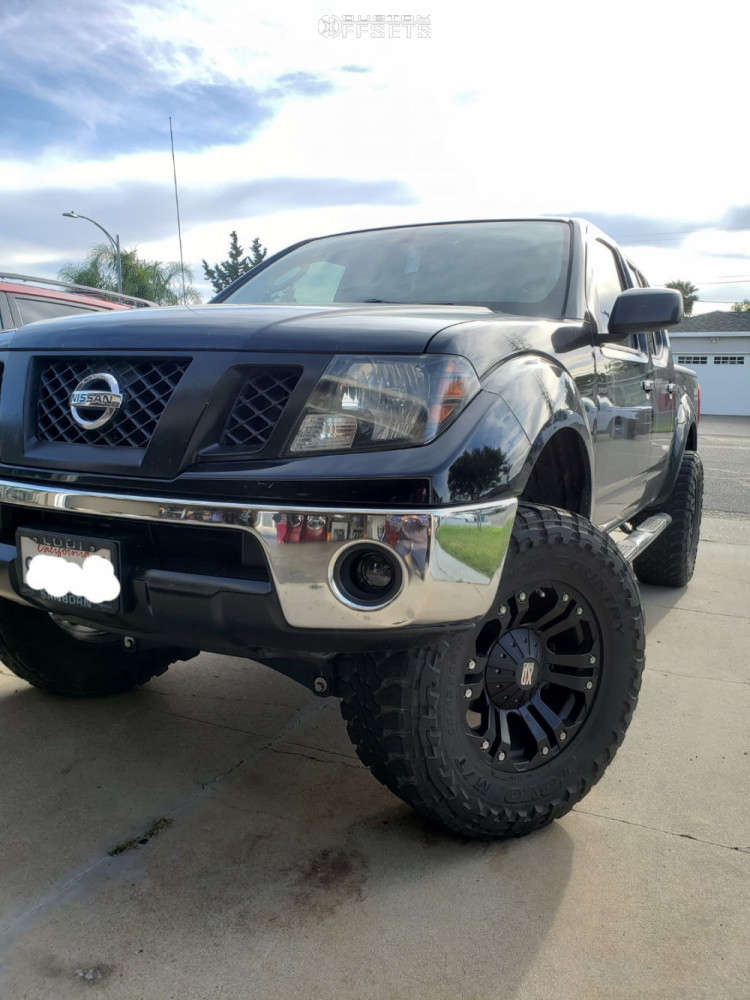 2010 Nissan Frontier with 18x9 18 XD Rockstar and 35/12.5R18 Toyo Tires ...