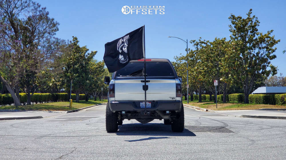 2014 Ram 2500 with 18x9.5 -18 Black Rhino Abrams and 35/12.5R18 Radar ...