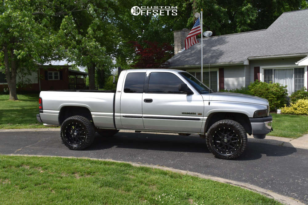 2001 Dodge Ram 1500 with 20x10 -24 XD Grenade and 33/12.5R20 Maxxis ...