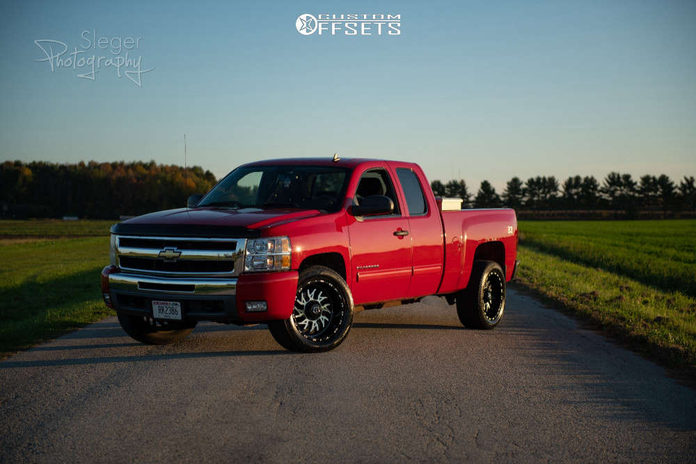 2010 Chevrolet Silverado 1500 with 20x10 -29 TIS 544 and 305/55R20 Toyo ...