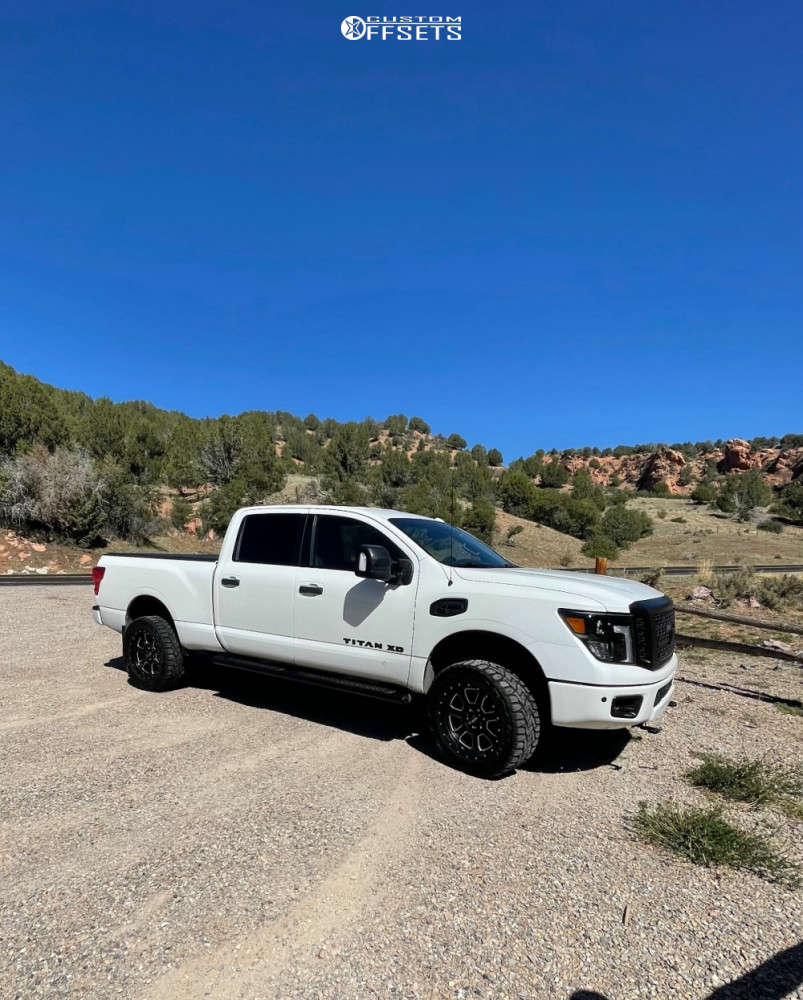 2019 Nissan Titan XD with 20x9 -15 Pro Comp Extreme and 33/12.5R20 Toyo ...