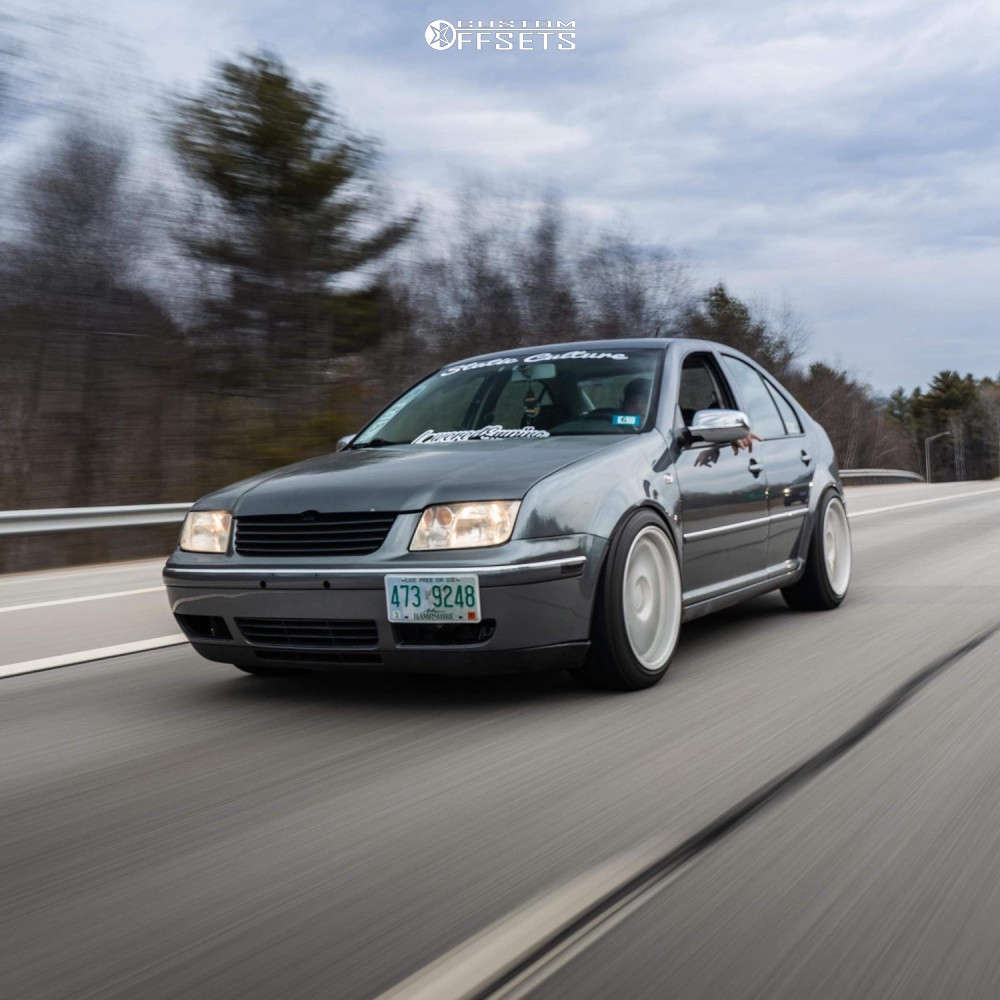 2004 Volkswagen Jetta with 18x9.5 35 ESR Cs01 and 225/35R18 Firestone ...