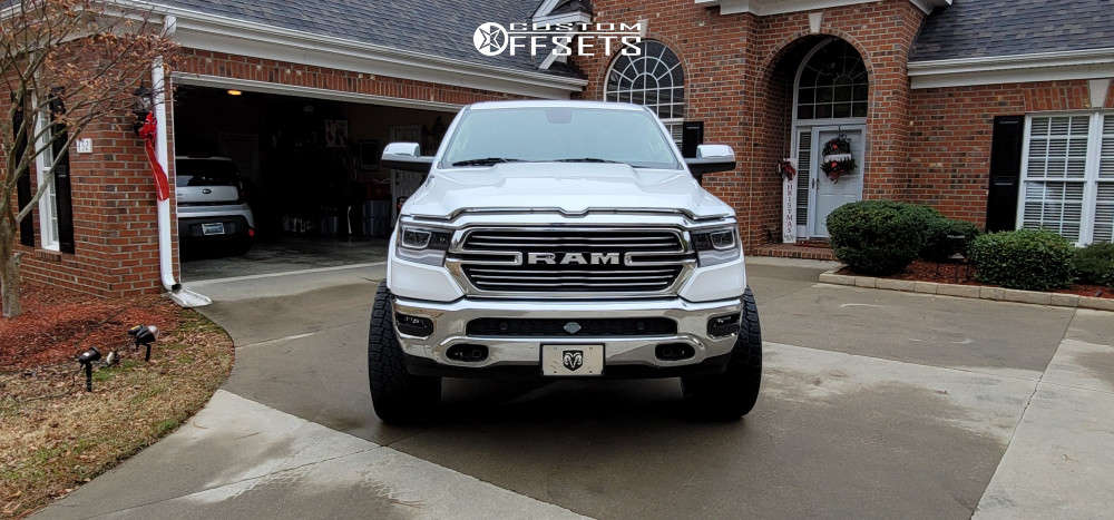 2019 Ram 1500 with 24x14 -76 Monster Offroad M12 and 325/45R24 Nitto ...