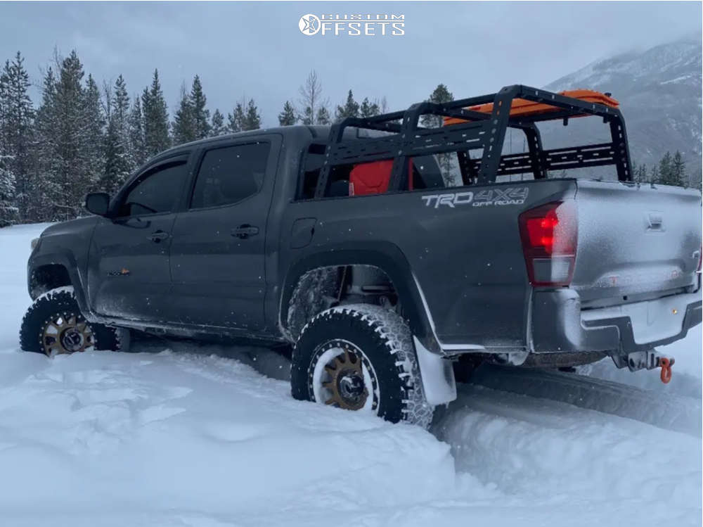2018 Toyota Tacoma with 18x9 -12 Method Mr305 and 265/70R18 Maxxis Razr ...