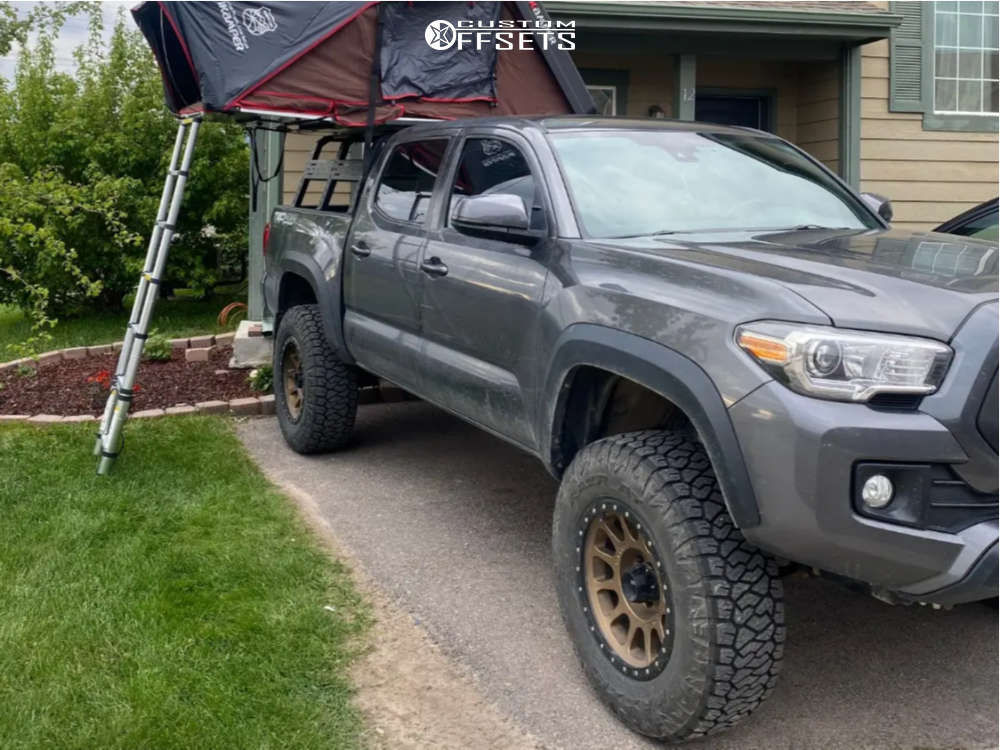 2018 Toyota Tacoma with 18x9 -12 Method Mr305 and 265/70R18 Maxxis Razr ...