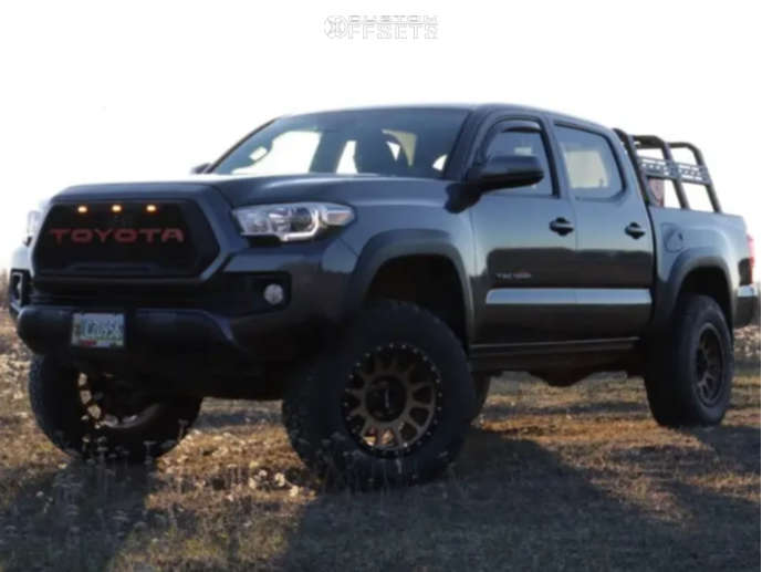 2018 Toyota Tacoma with 18x9 -12 Method Mr305 and 265/70R18 Maxxis Razr ...