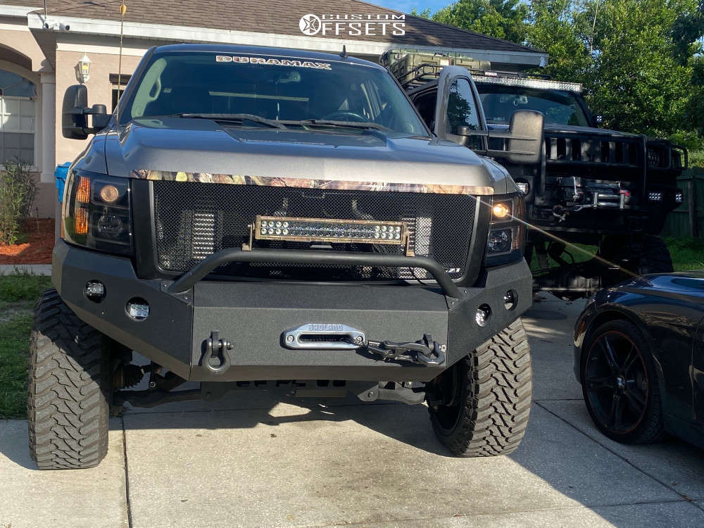 2006 Hummer H3 with 22x12 -51 Vision Rocker and 33/12.5R22 Atturo Trail ...